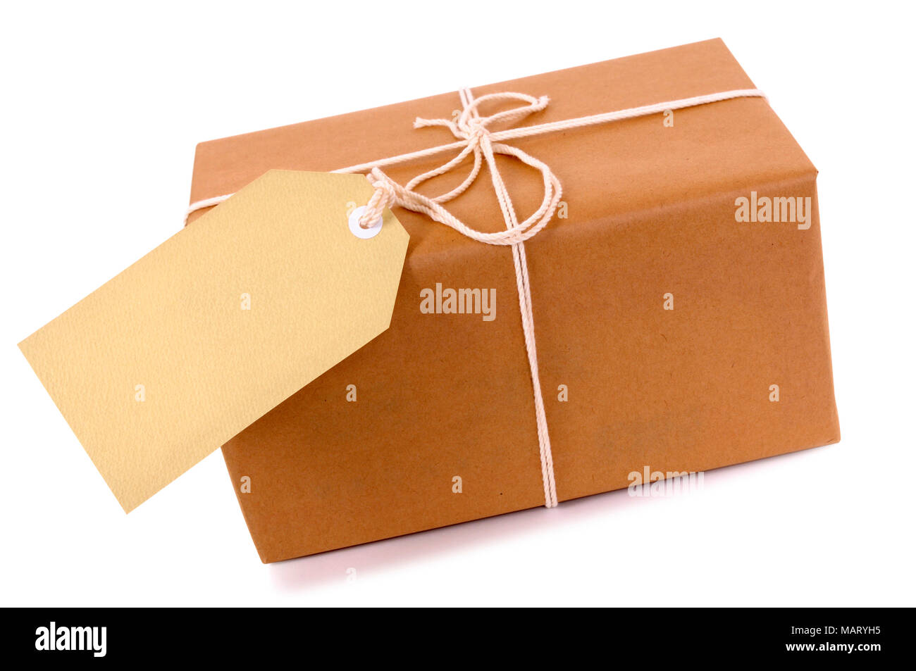 Small brown package with manila label isolated Stock Photo - Alamy