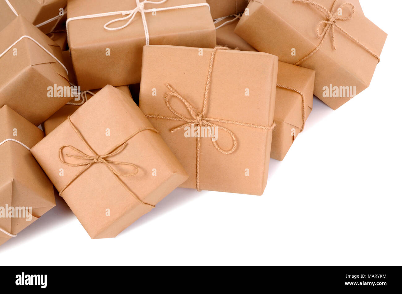 Untidy pile of brown parcels Stock Photo - Alamy