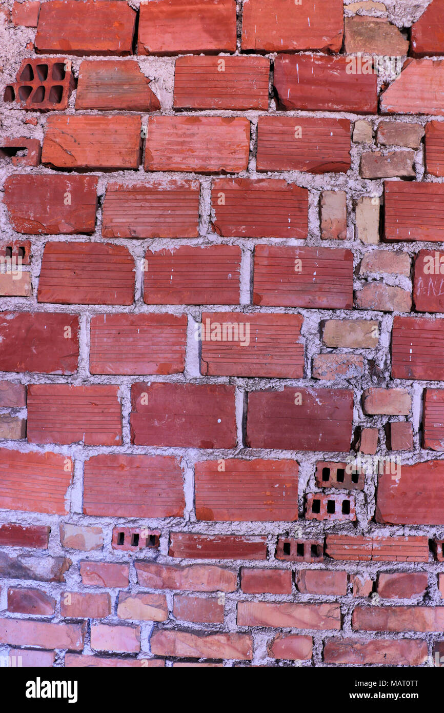 orange wall bricks of different sizes Stock Photo - Alamy