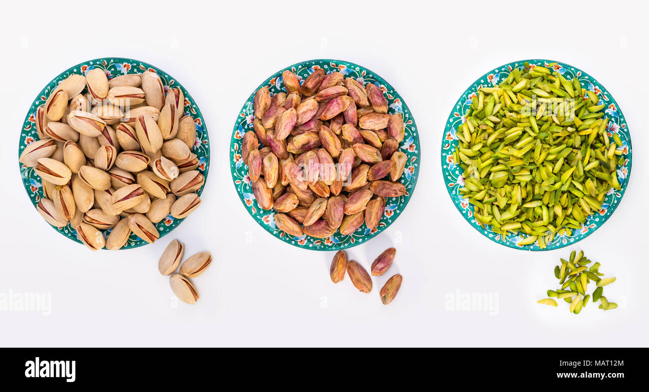 Top View Shot Of Three Different Shelled, Kernels and Sliced Pistachio ...