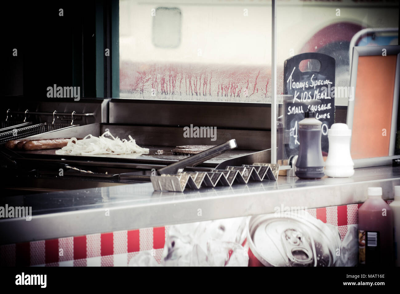 Burger stall serving up hot dogs and burgers on the grill Stock Photo ...