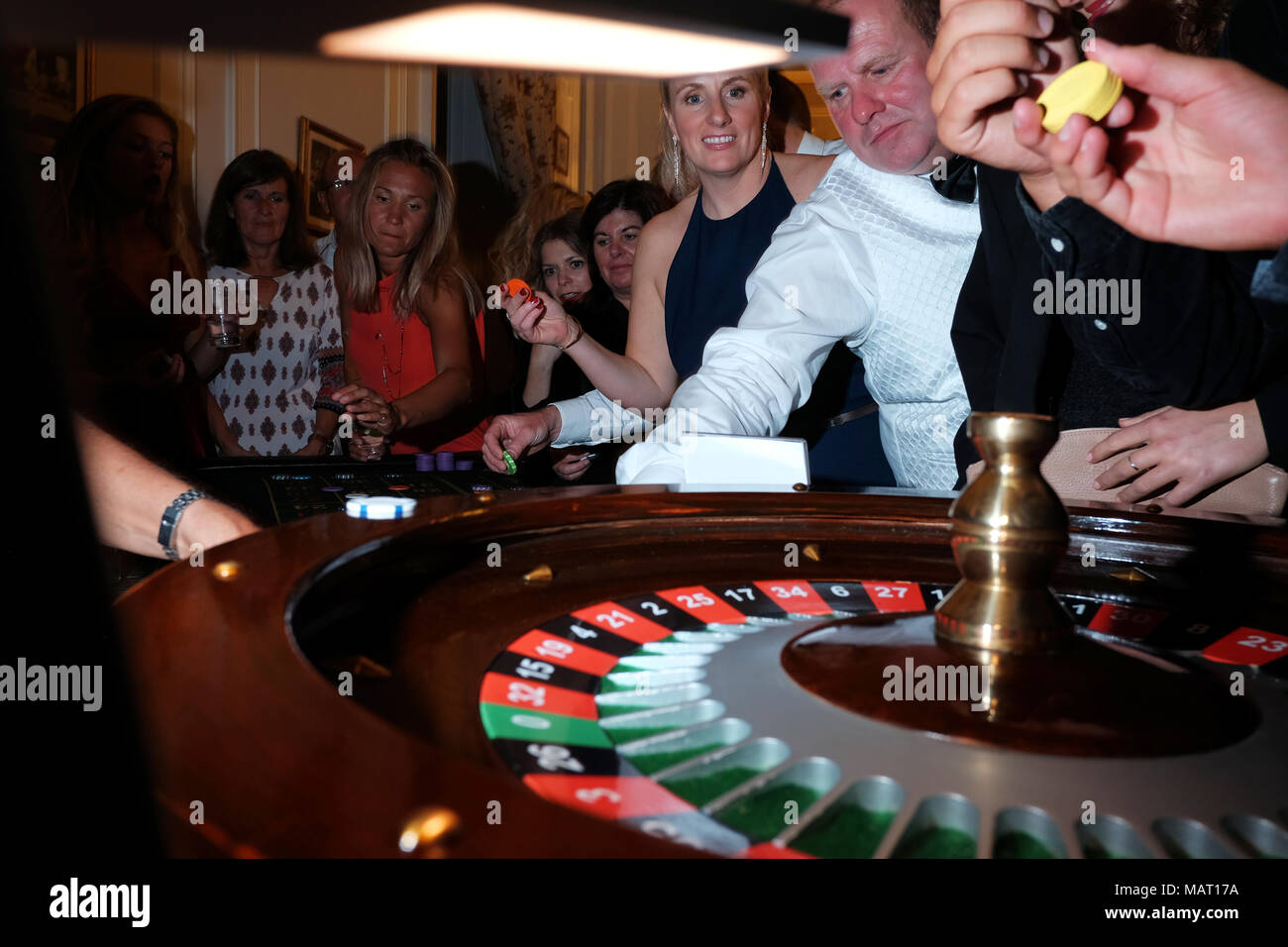 Gamblers gambling for fun at a corporate event Stock Photo - Alamy