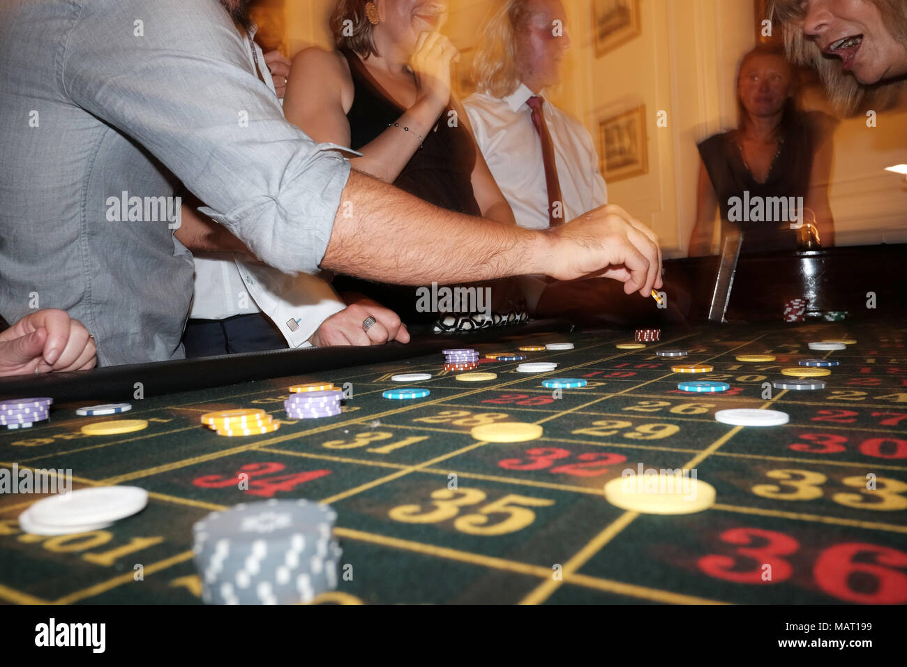 Gamblers gambling for fun at a corporate event Stock Photo - Alamy
