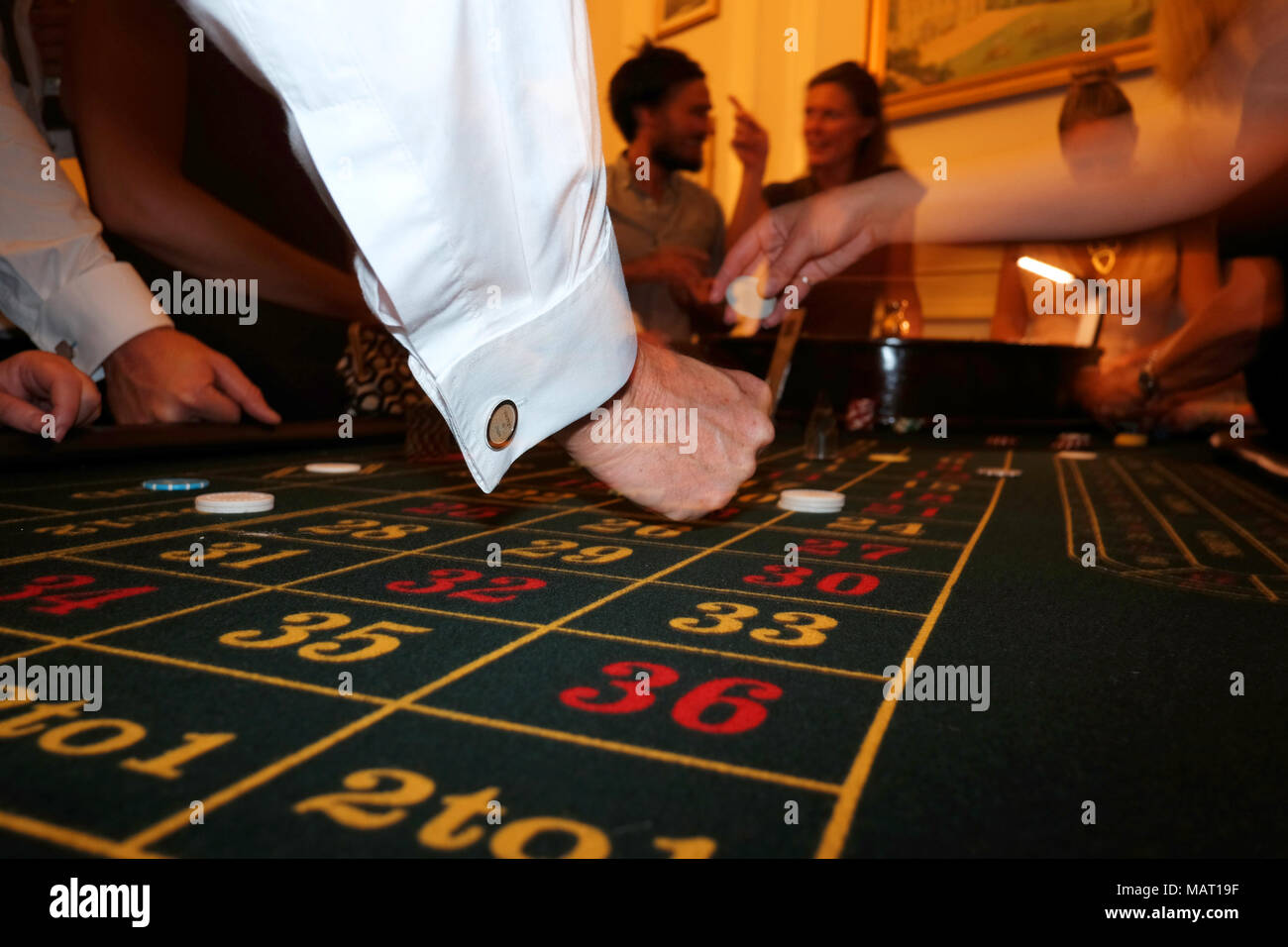 Gamblers gambling for fun at a corporate event Stock Photo - Alamy