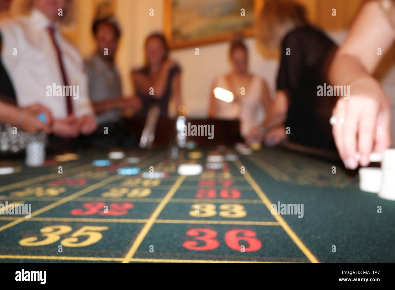 Gamblers gambling for fun at a corporate event Stock Photo - Alamy