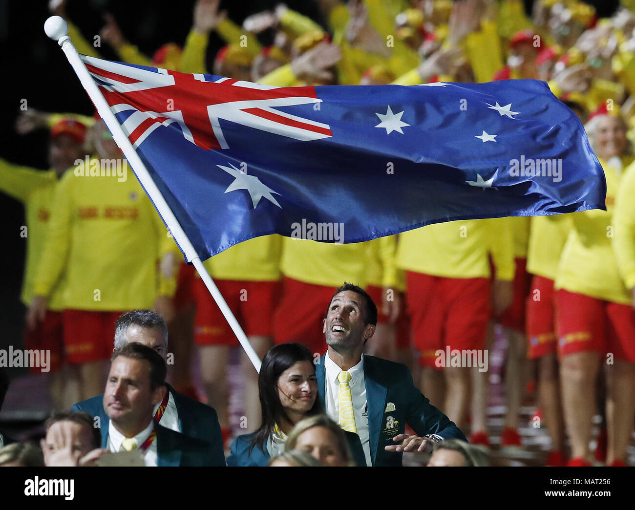 Australian flag bearer Mark Knowles leads the team out during the ...