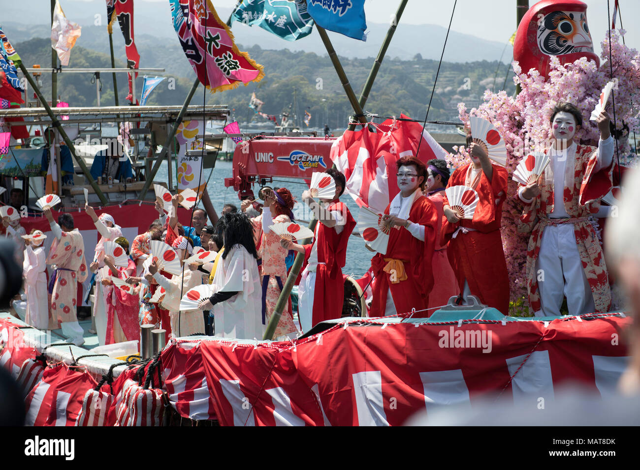 NUMAZU, JAPAN - APRIL 4: A boat load of dancing fishermen with their ...