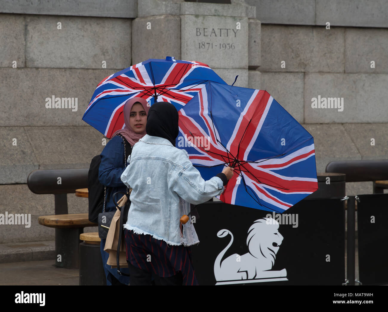 London, UK. 4th Apr, 2018. Heavy Rainfall in Trafalgar Square, London ...