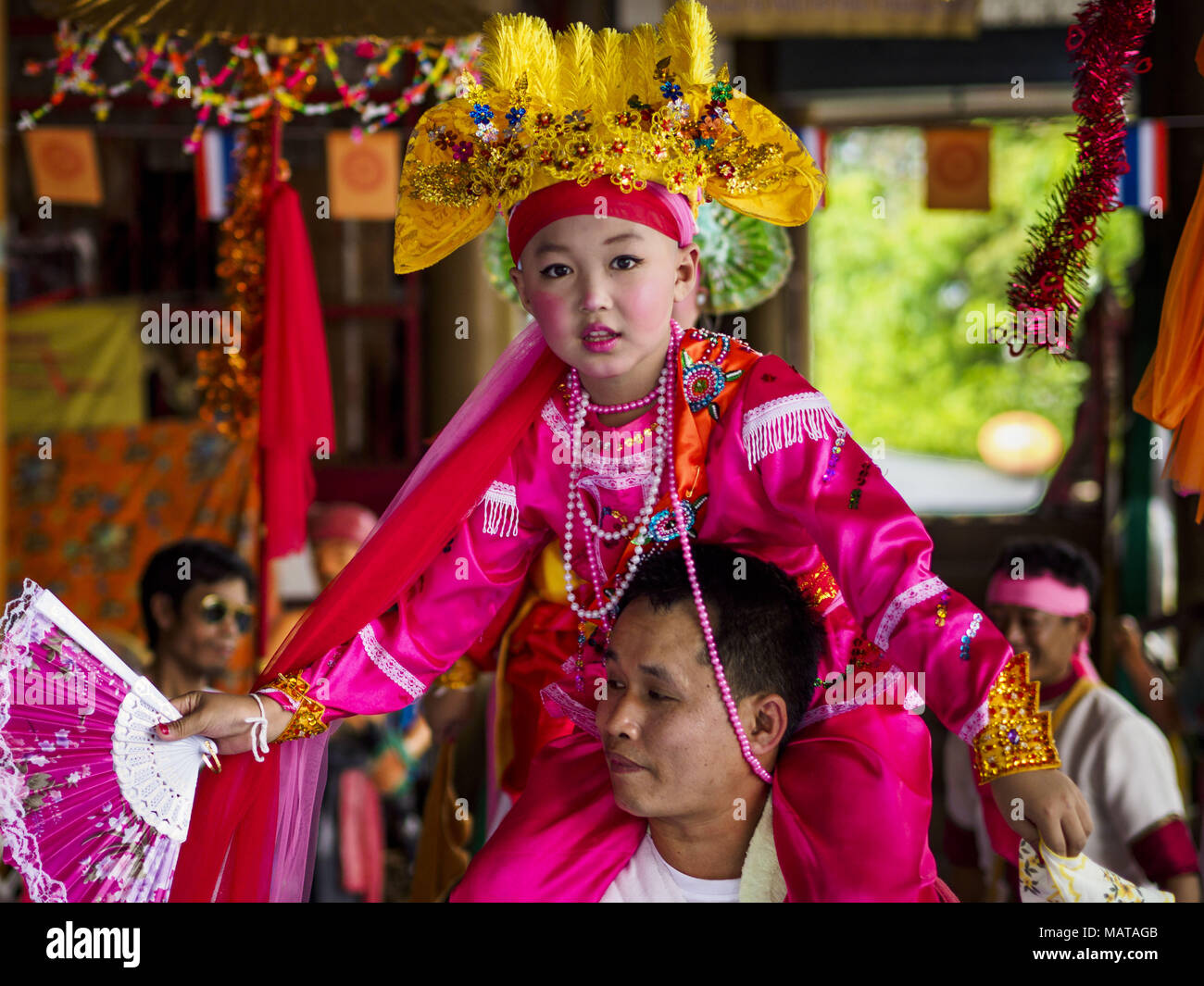Chiang Mai, Chiang Mai, Thailand. 4th Apr, 2018. A Shan boy is carried ...