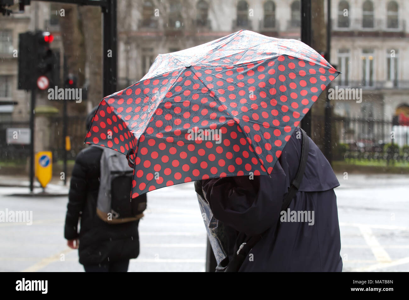 London, UK. 4th April 2018. UK Weather: Heavy Rainfall in Victoria ...