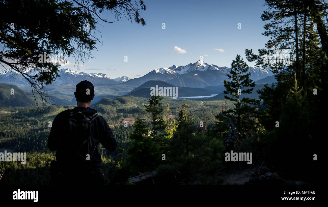 Female hiker enjoying the view over the Bridge River Valley, including ...