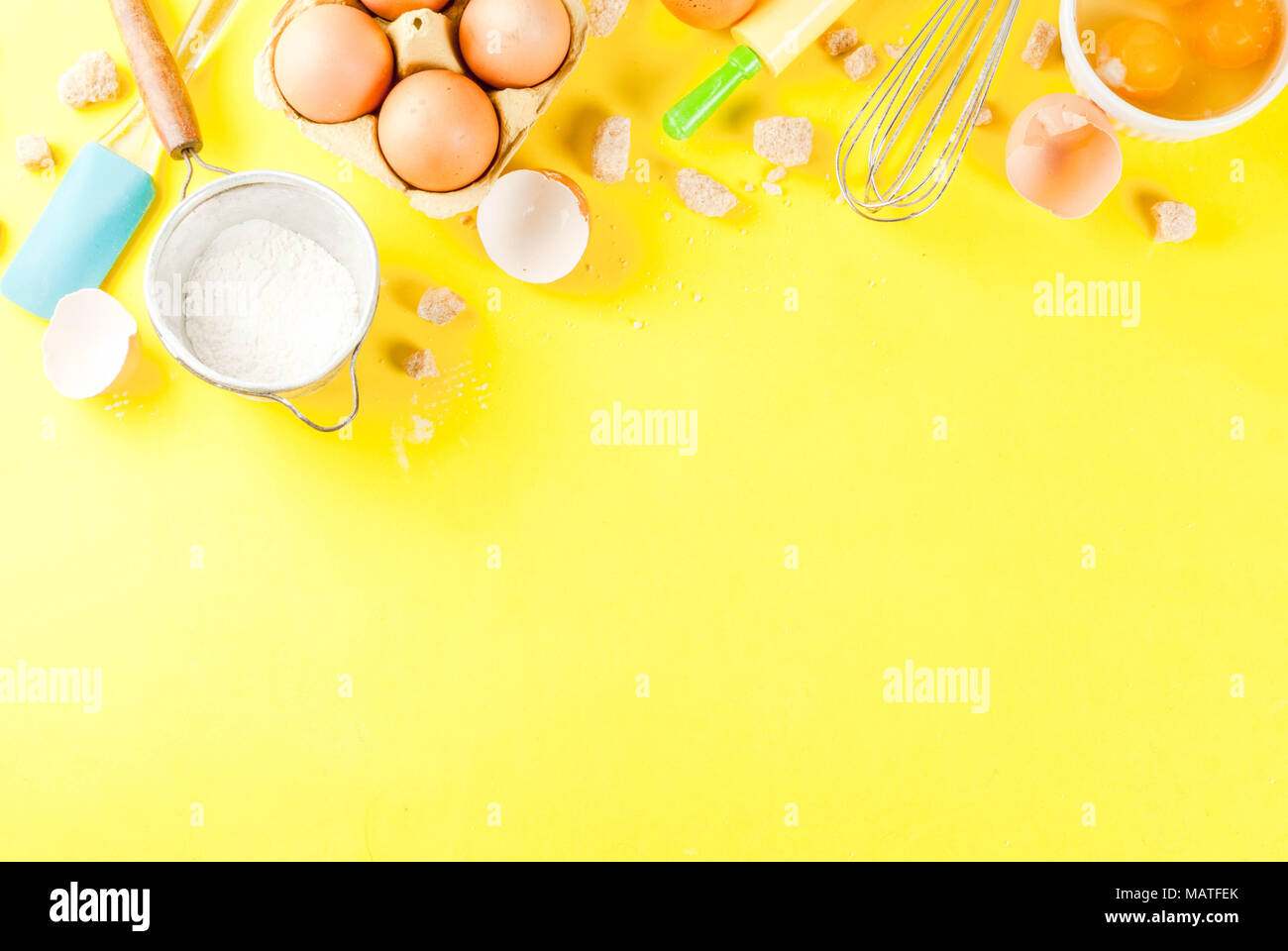 Ingredients and utensils for cooking baking egg, flour, sugar, whisk ...