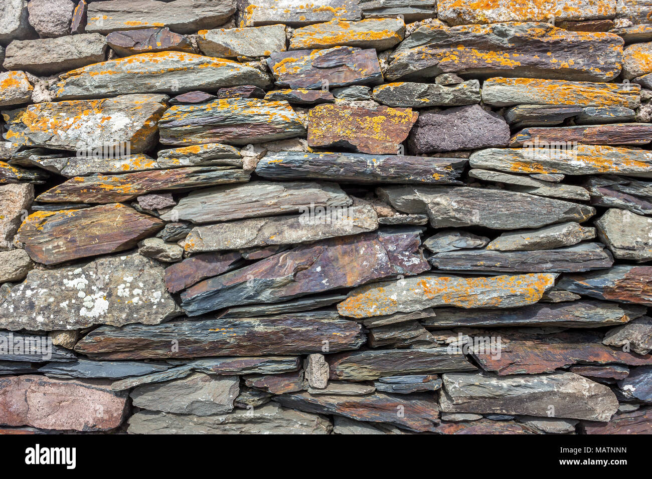 rural stonewall/Typical stone wall in a Caucasus village Stock Photo ...