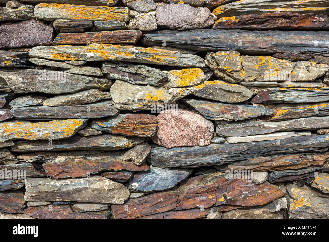 rural stonewall/Typical stone wall in a Caucasus village Stock Photo ...