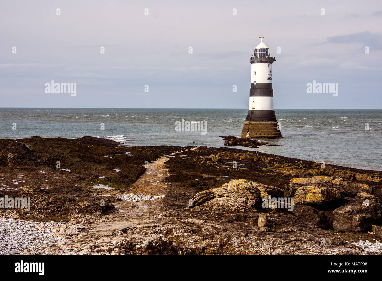 Black Point Lighthouse and Puffin Island, Anglsey Stock Photo - Alamy