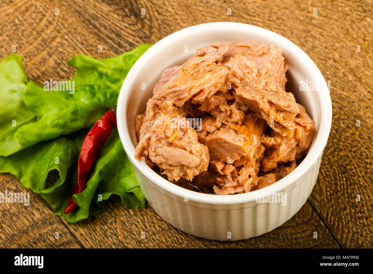 Canned tuna fish in the bowl ready for cooking Stock Photo - Alamy