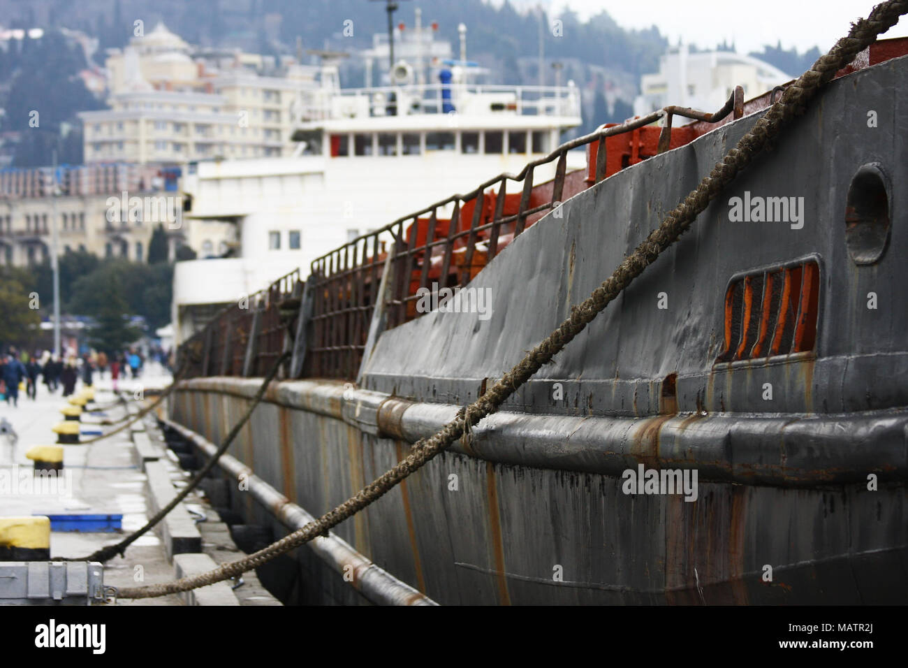 Old rusty cargo ship moored at civil port. . Aged vessel recycling ...