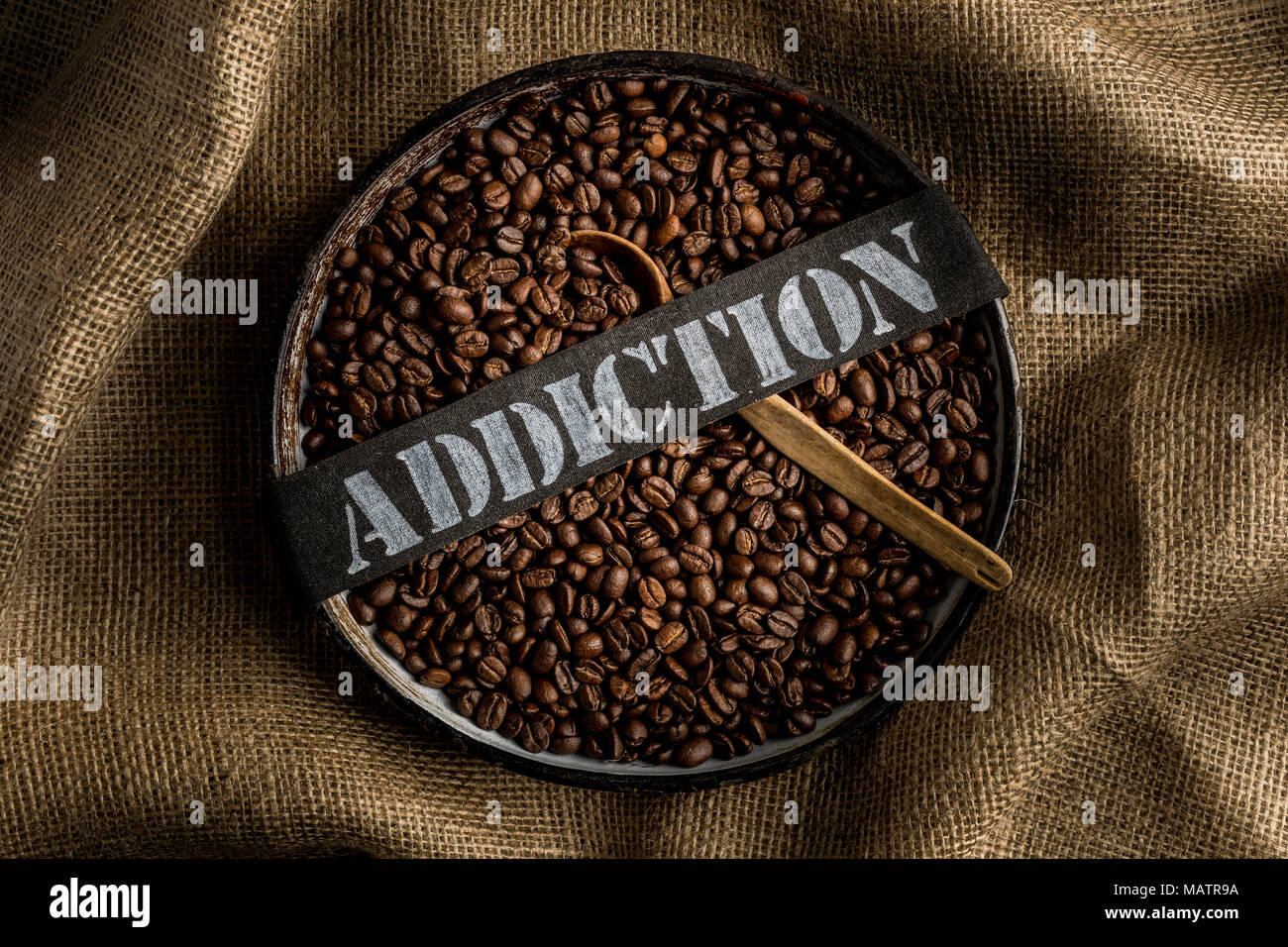 Coffee addiction on red background Stock Photo - Alamy