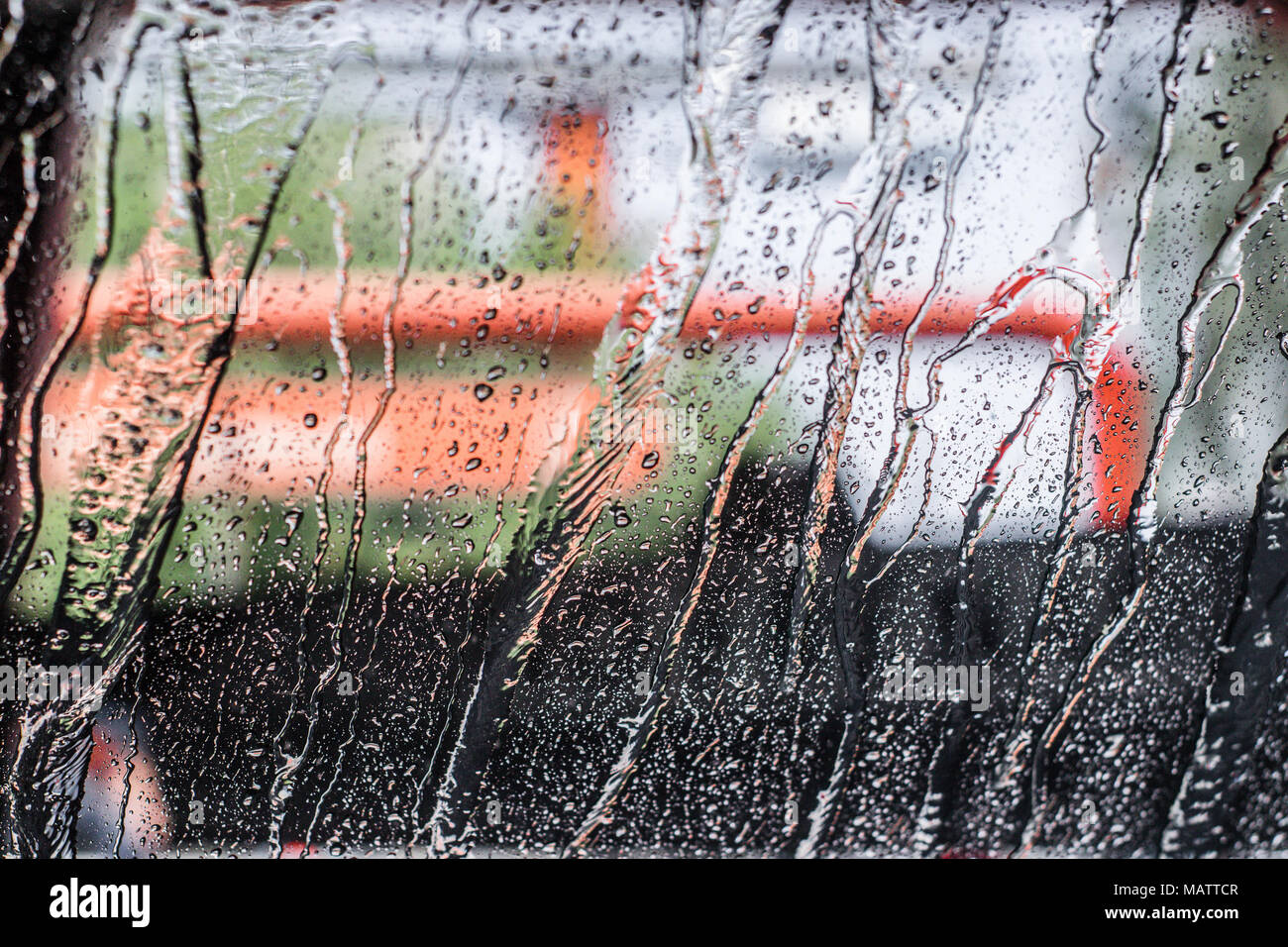 Photograph of a wet car window in car wash Stock Photo - Alamy