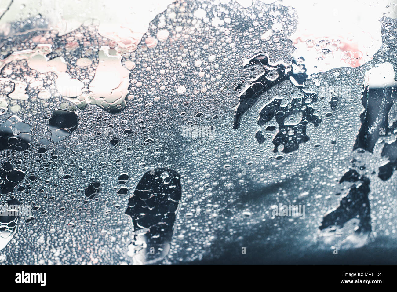 Photograph of a wet car window in car wash Stock Photo - Alamy
