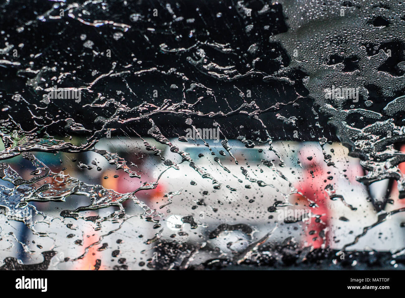 Photograph of a wet car window in car wash Stock Photo - Alamy