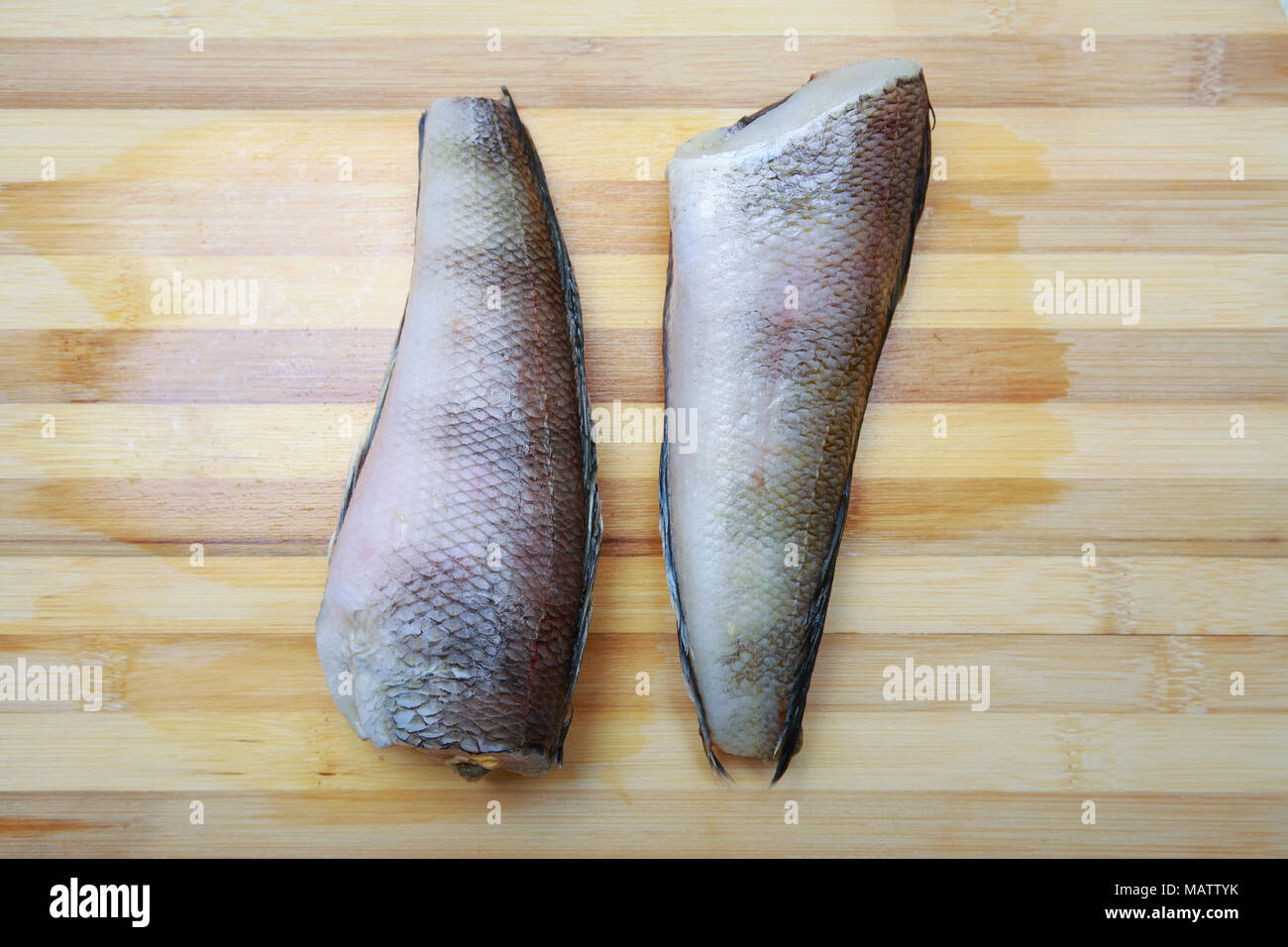 Cutting fish pieces hi-res stock photography and images - Alamy