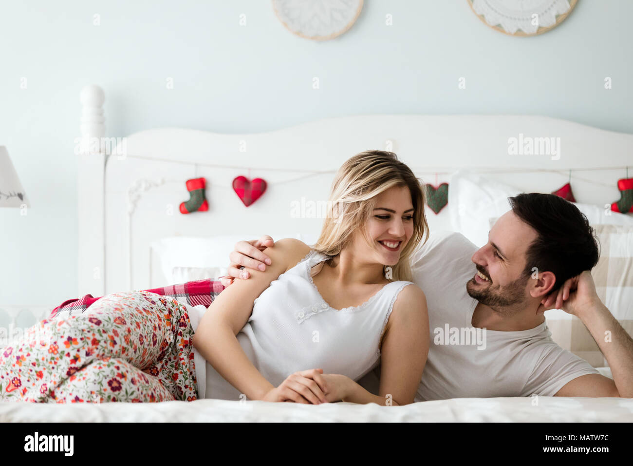 Couple in bedroom hi-res stock photography and images - Alamy