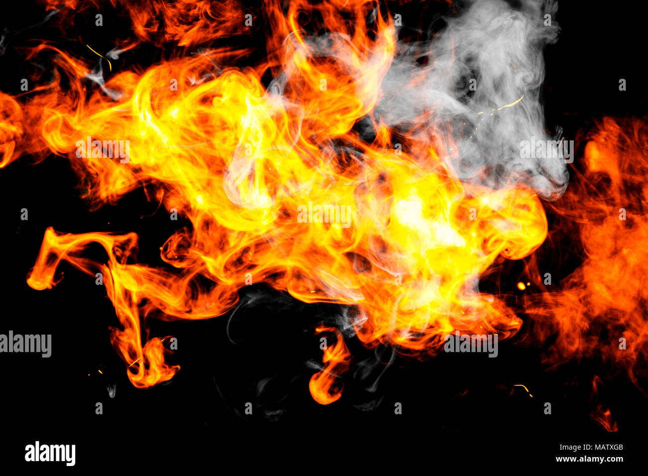 Fire flames background. Dense fiery smoke on a black isolated ...