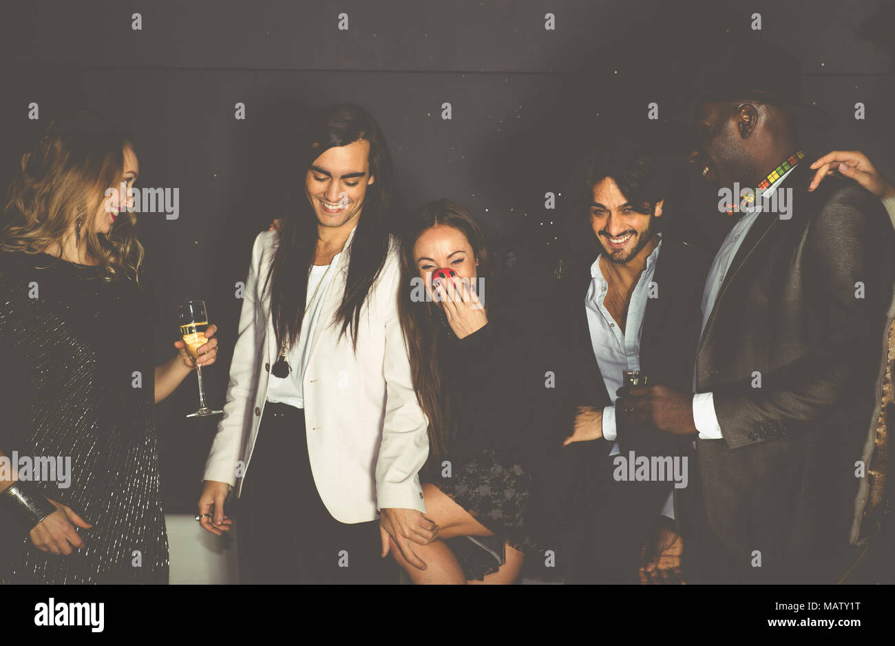 Party people celebrating in the club Stock Photo - Alamy