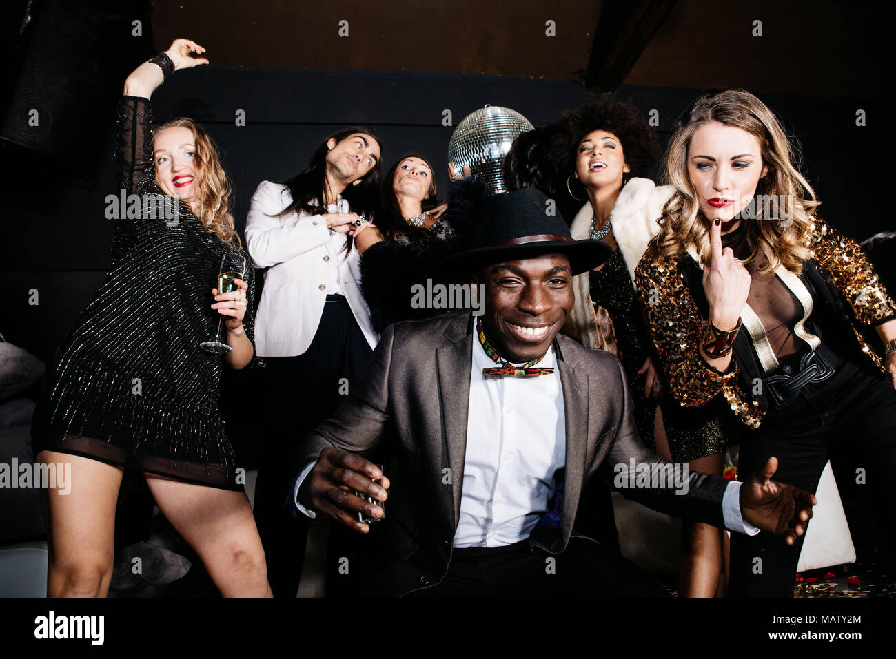 Party people celebrating in the club Stock Photo - Alamy