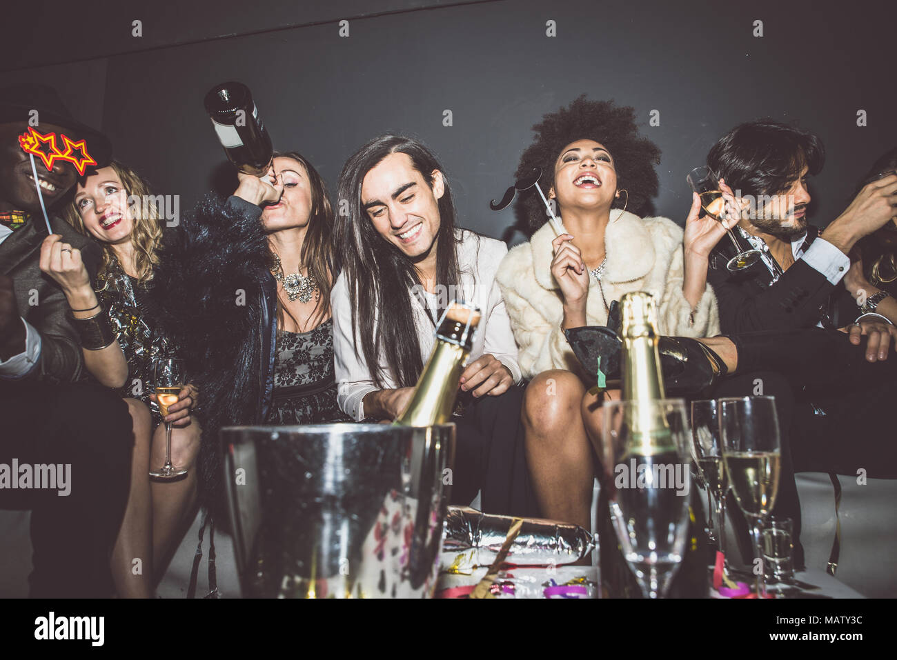 Party people celebrating in the club Stock Photo - Alamy