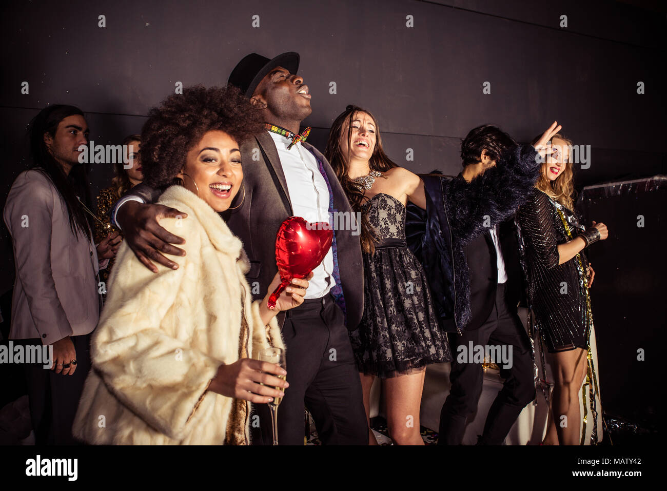 Party people celebrating in the club Stock Photo - Alamy