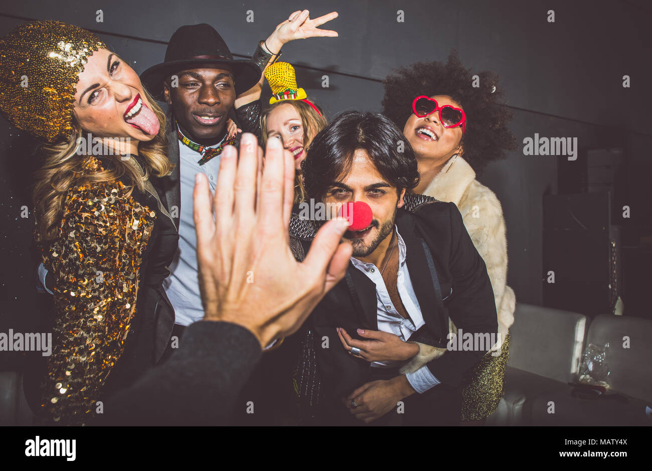 Party people celebrating in the club Stock Photo - Alamy
