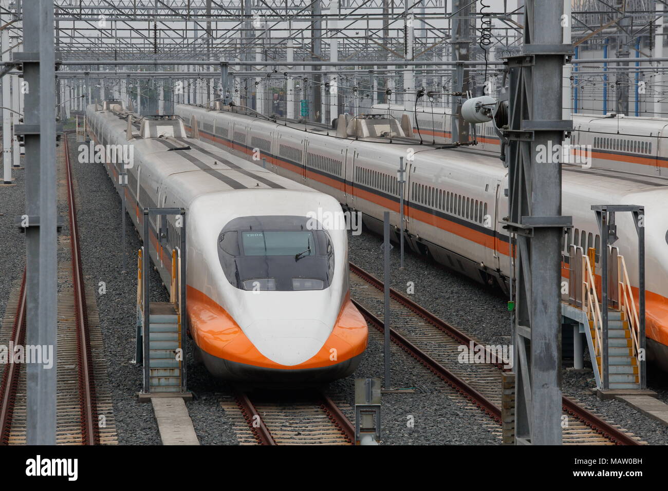 Train of Taiwan high speed rail drives on tracks Stock Photo - Alamy