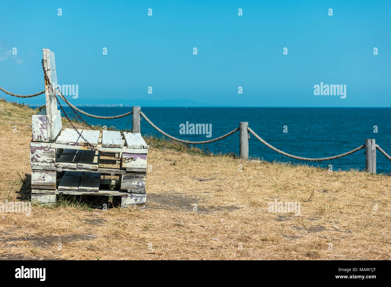 Wooden benches on the high seashore. Seascape Stock Photo - Alamy