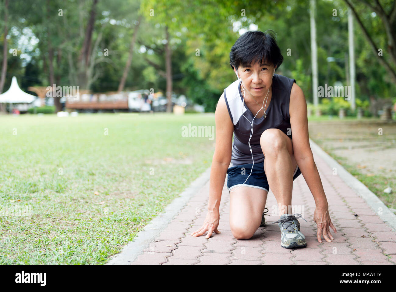 Senior asian woman smiling hi-res stock photography and images - Alamy