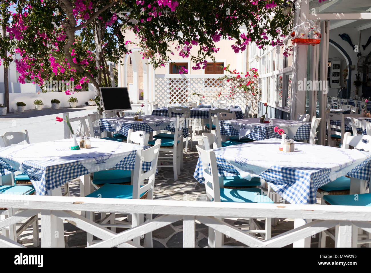 restaurant terrace in front of the beach in kamari on the island of ...
