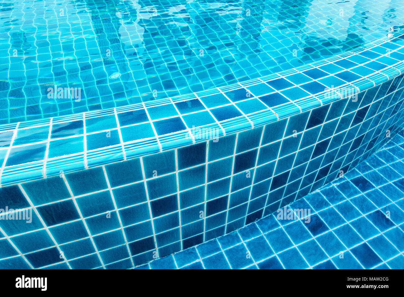 Ceramic tile of swimming pool with water reflection Stock Photo - Alamy