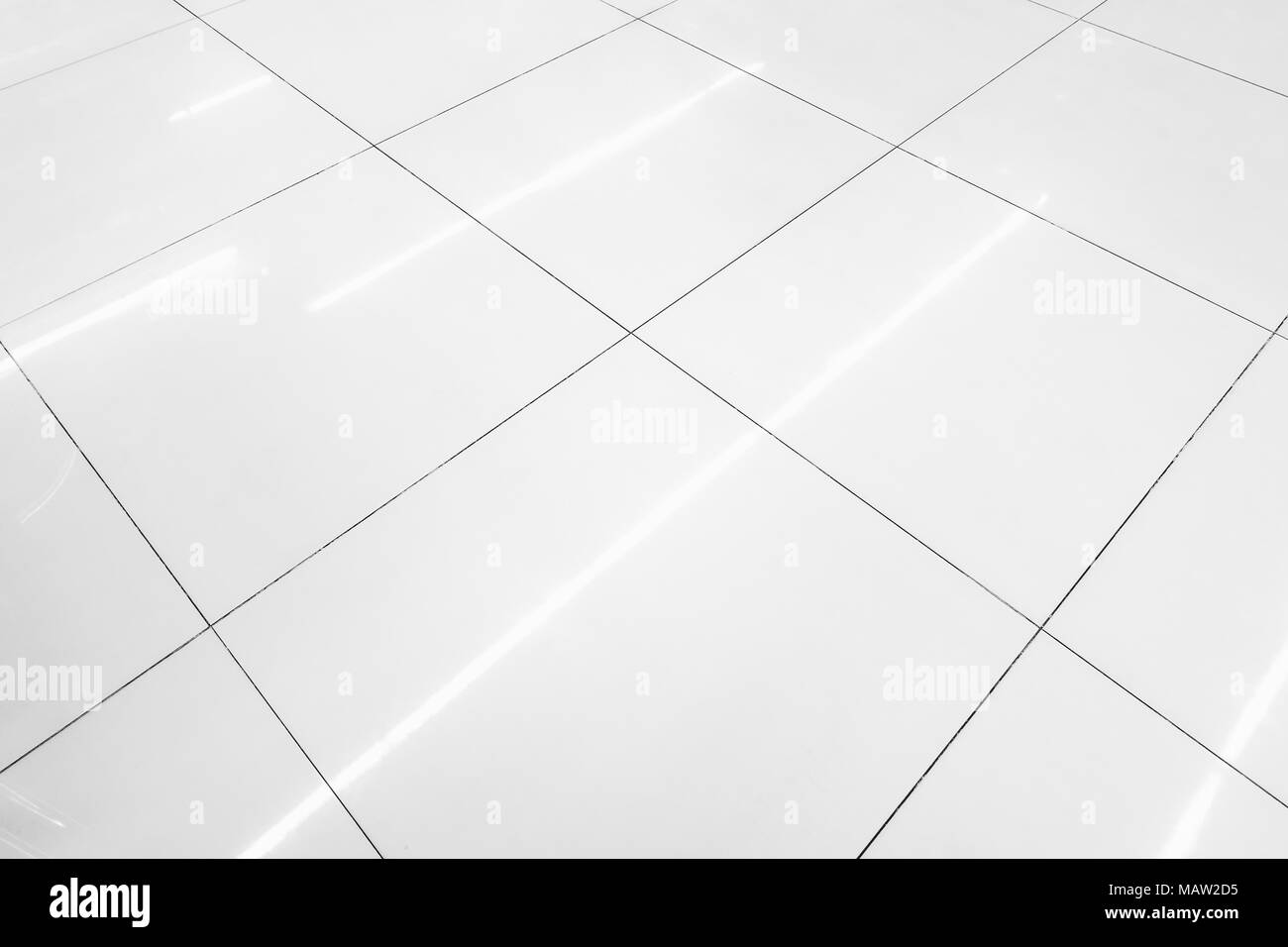 Flooring tile background and reflection of luminaire Stock Photo - Alamy