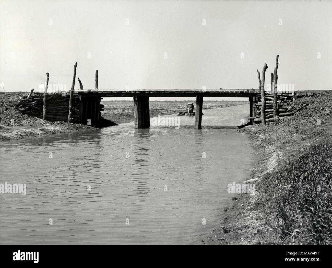 Irrigation canal and bridge with floating irrigation pump, Rhodesian ...