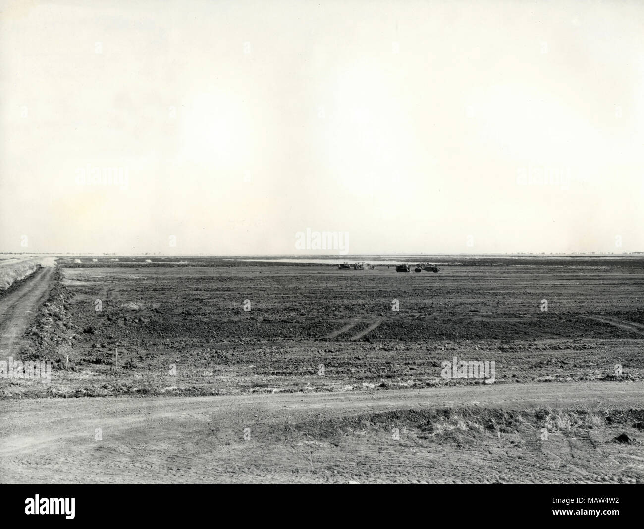 Surface irrigation farm showing soil conservation machines, Rhodesian ...