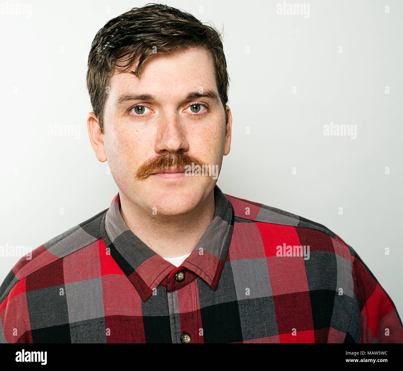 Person wearing plaid shirt hi-res stock photography and images - Alamy