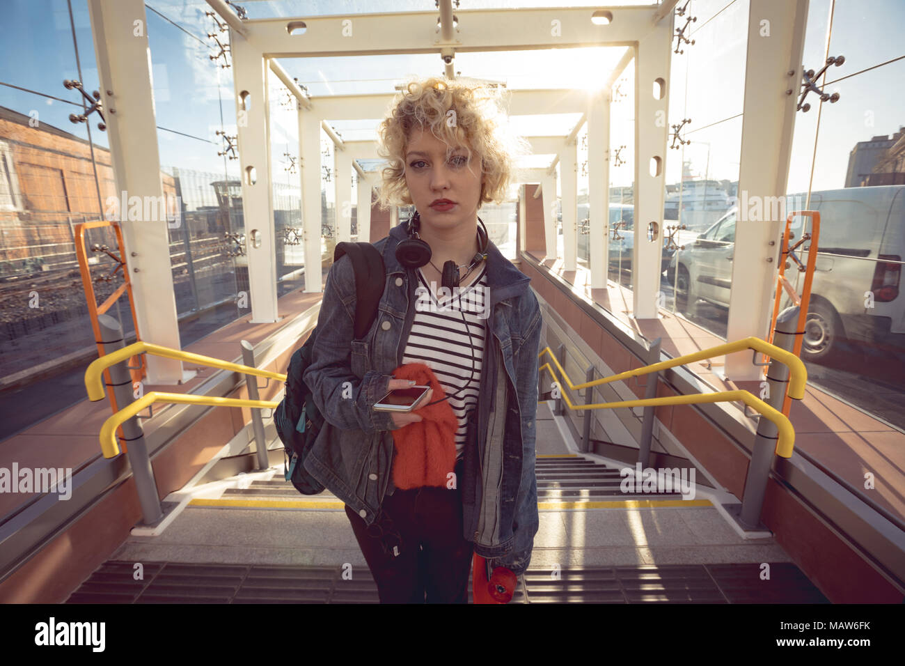 Woman walking upstairs in hi-res stock photography and images - Alamy
