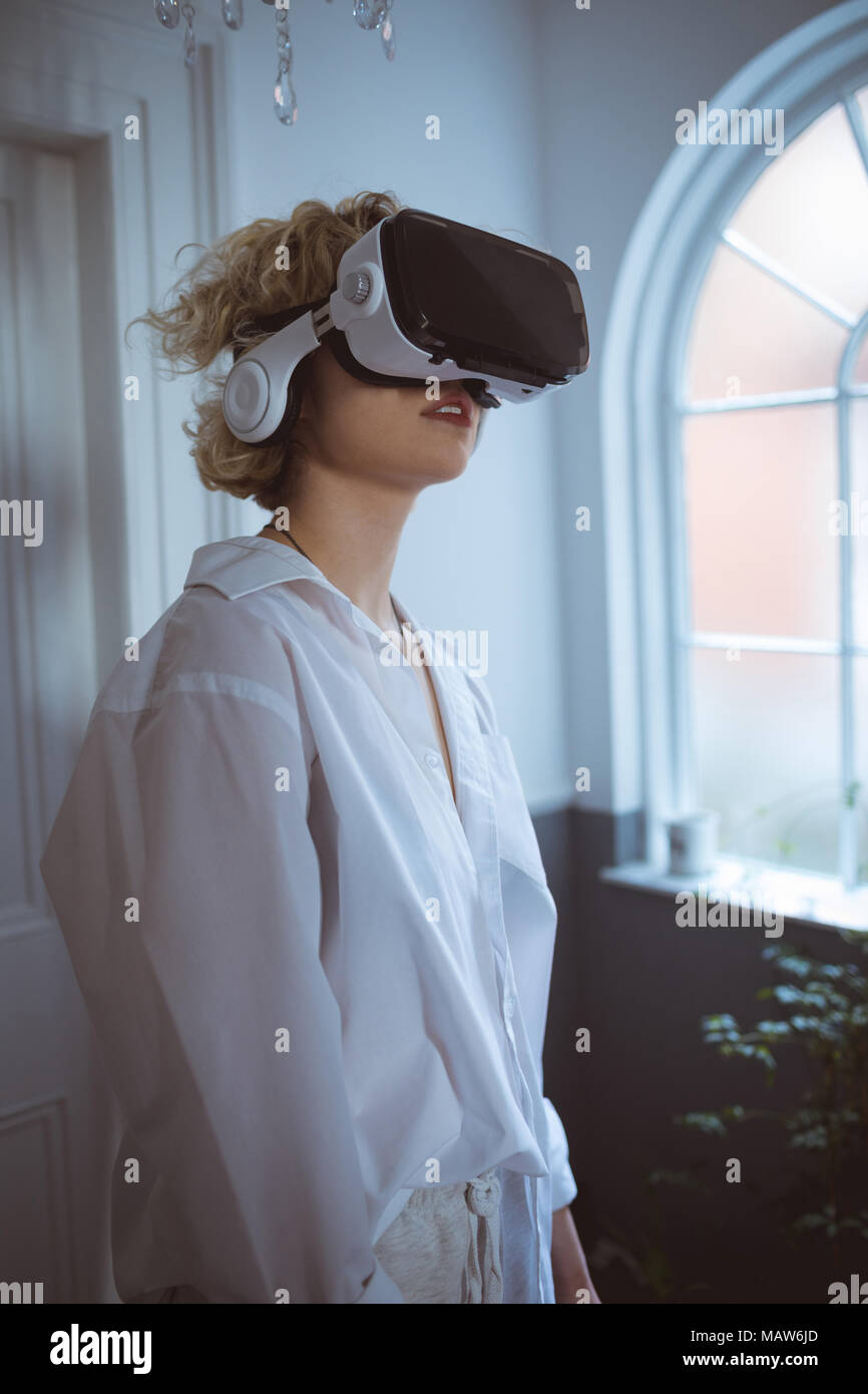 Woman home using virtual hi-res stock photography and images - Alamy
