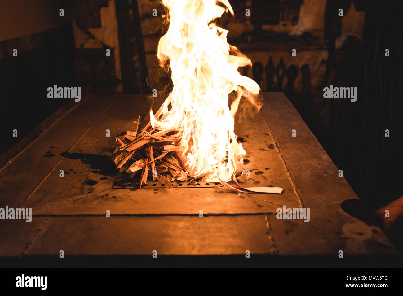 Fireplace in workshop Stock Photo - Alamy