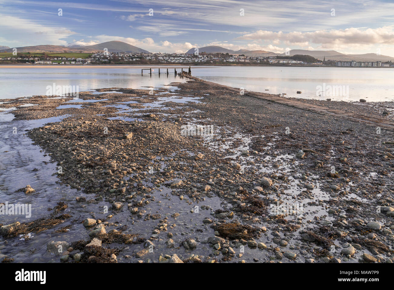 Old jetty on the Menai Straits at low tide, Anglesey, North Wales Stock ...