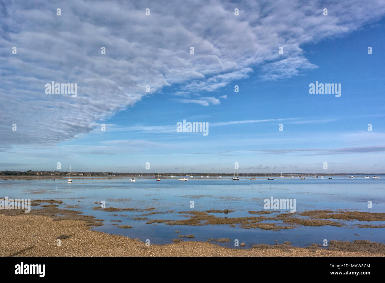 Beach with calm seas hi-res stock photography and images - Alamy
