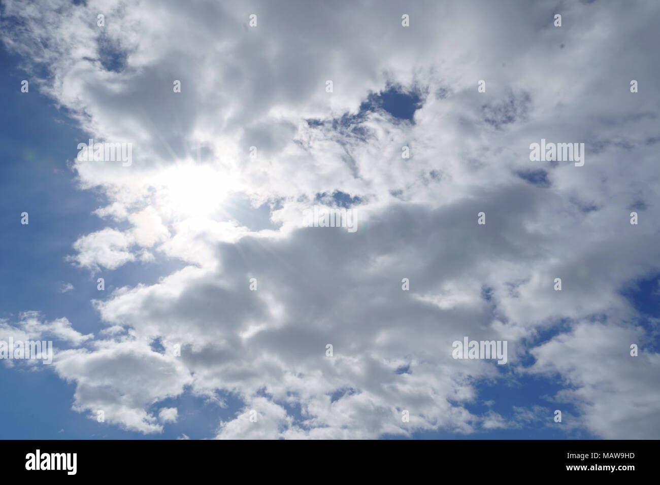 Large blue sky with white clouds on the lake at spring time during a ...