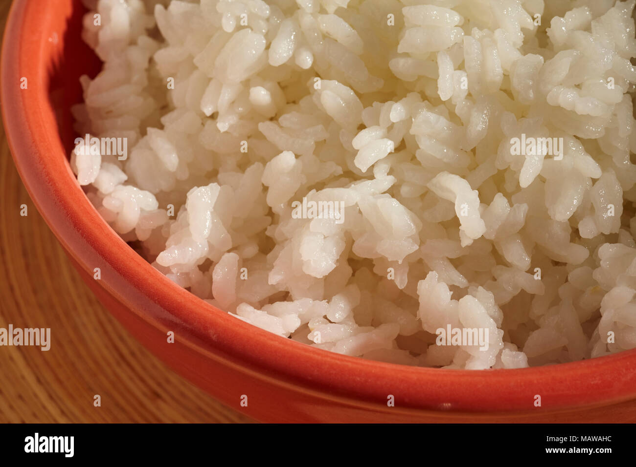 A bowl of cooked short grain white rice, commonly used in Korean and ...