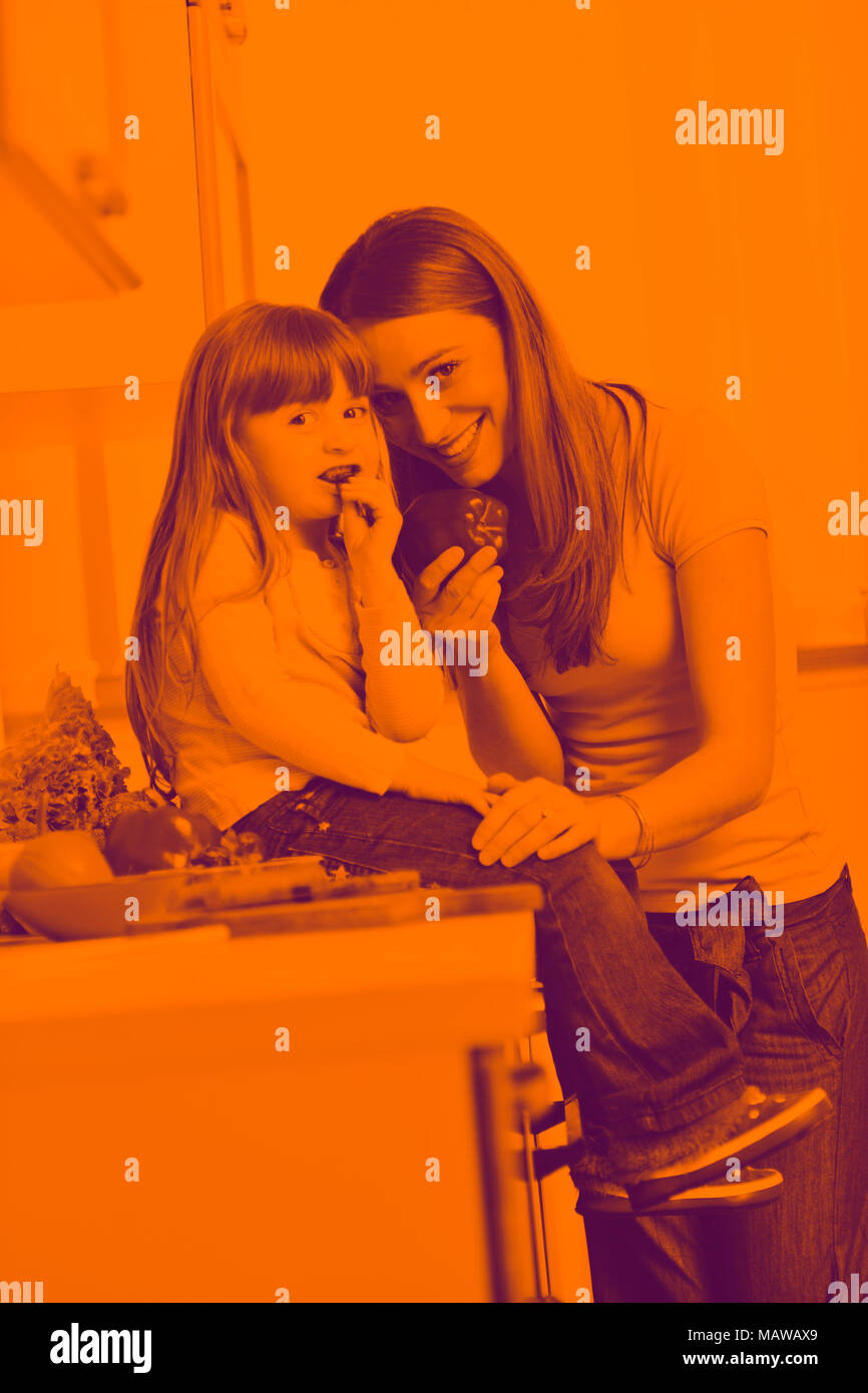 happy young family have lunch time with fresh fruits and vegetable food ...